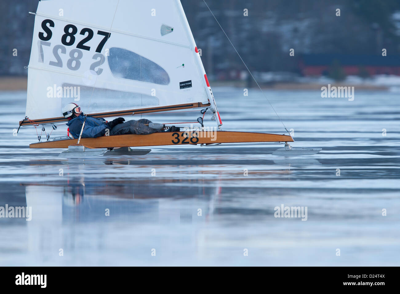 Ice yachting in the evening sun Stock Photo - Alamy