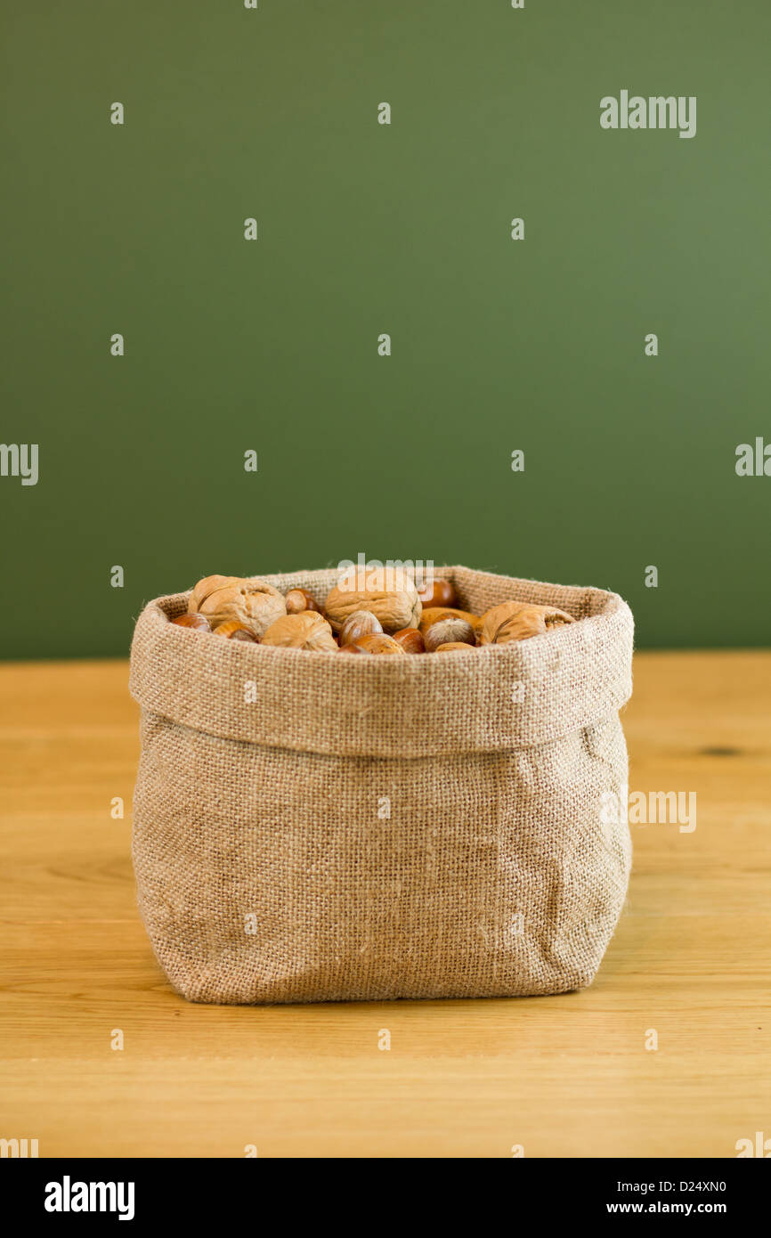 Hessian sack full of nuts Stock Photo - Alamy