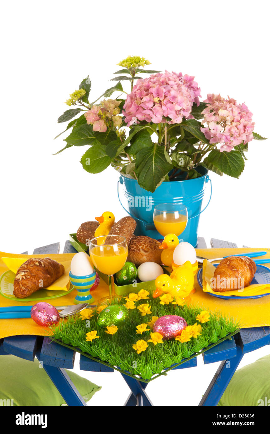 Detail easter table in blue and yellow Stock Photo - Alamy