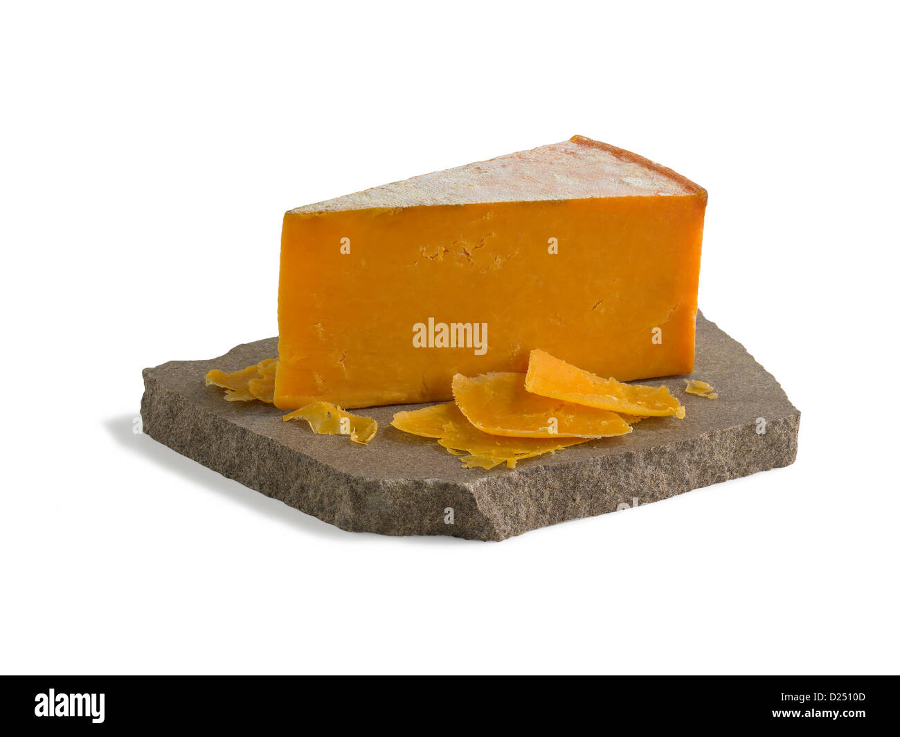 Block of cheddar cheese on stone outlined on white Stock Photo - Alamy