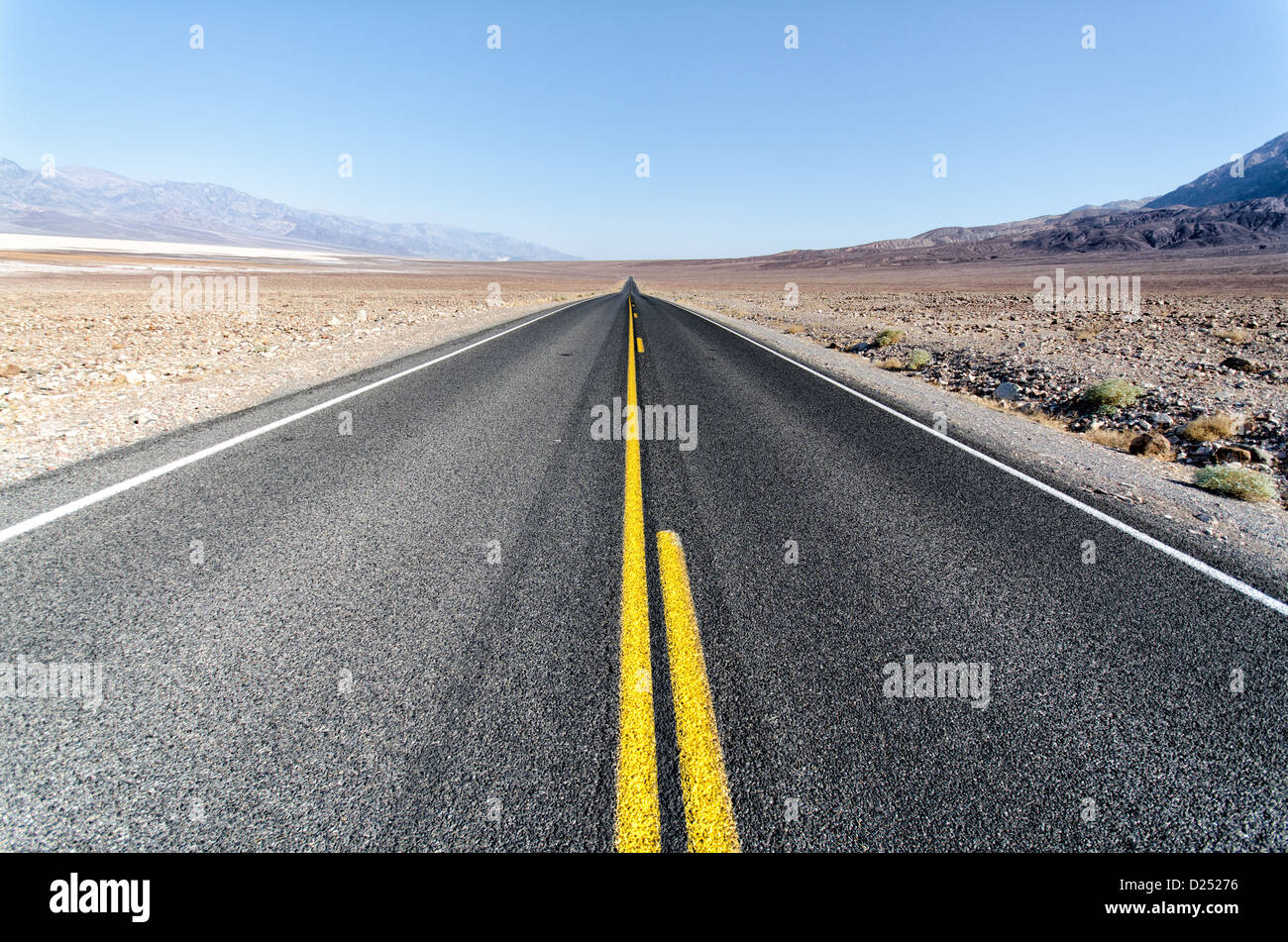 Empty desert road in Death Valley National Park Stock Photo - Alamy