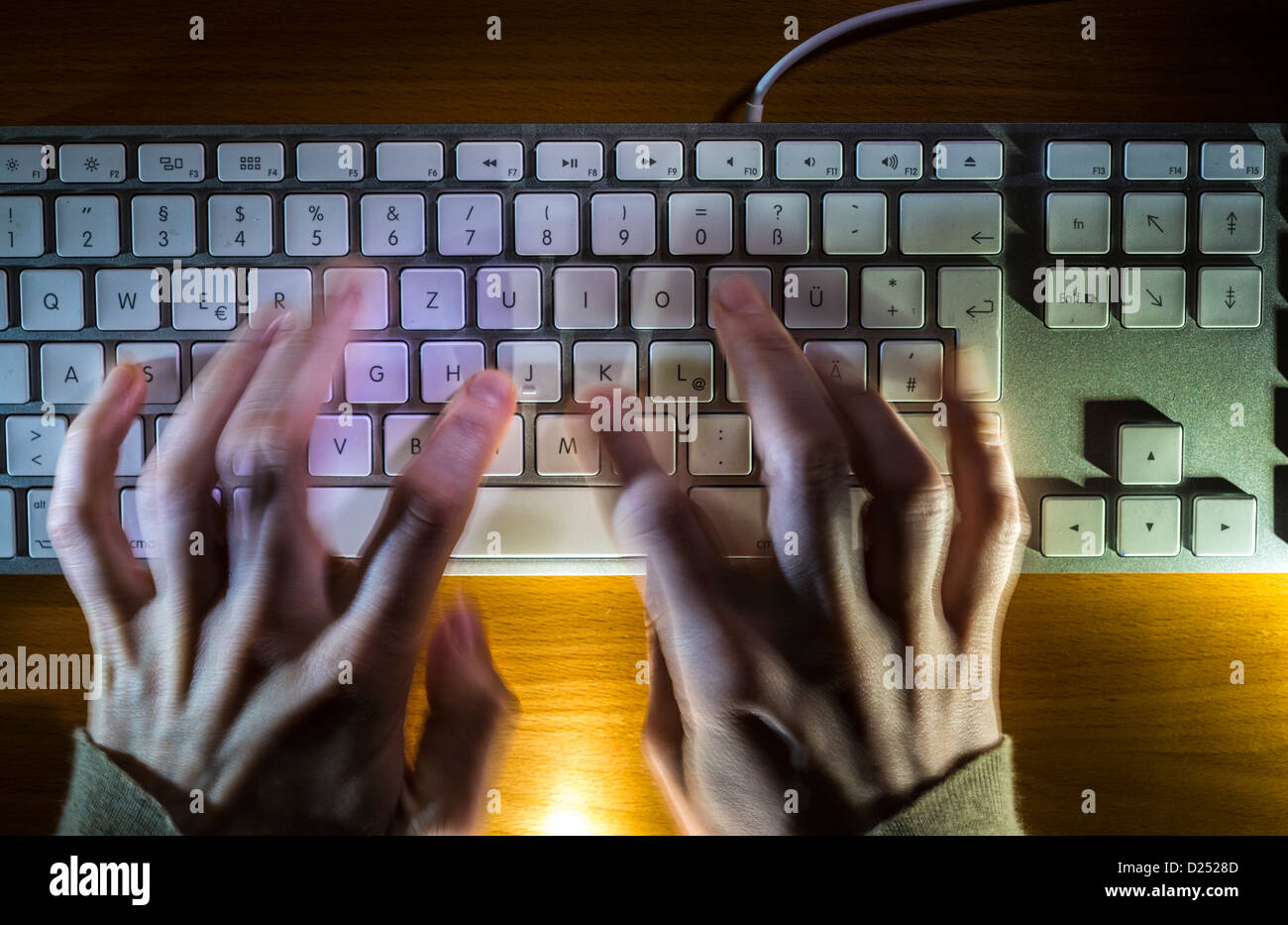 Working desktop computer using keyboard hi-res stock photography and ...