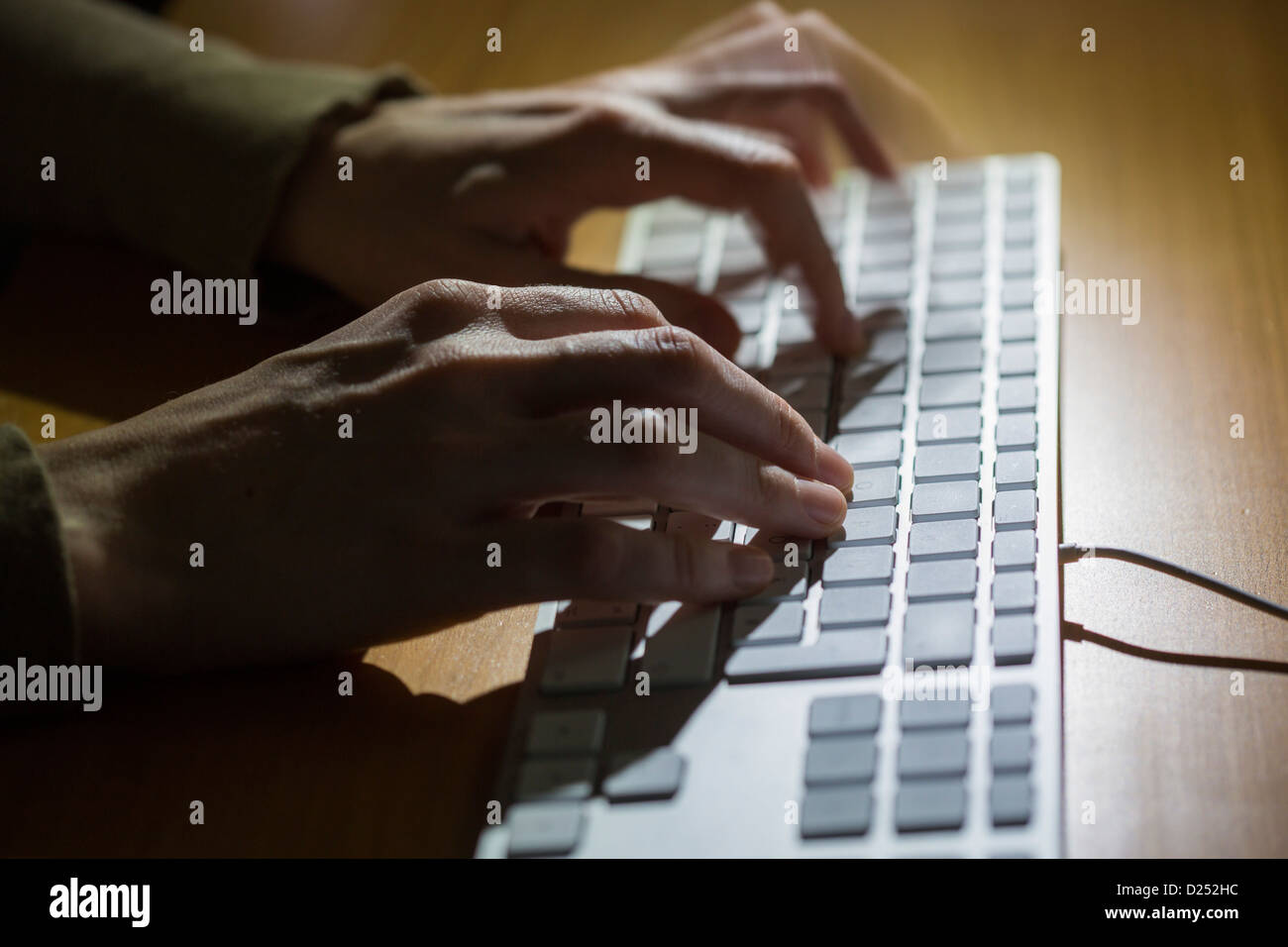 Person is working with a desktop computer. Typing on a keyboard Stock ...