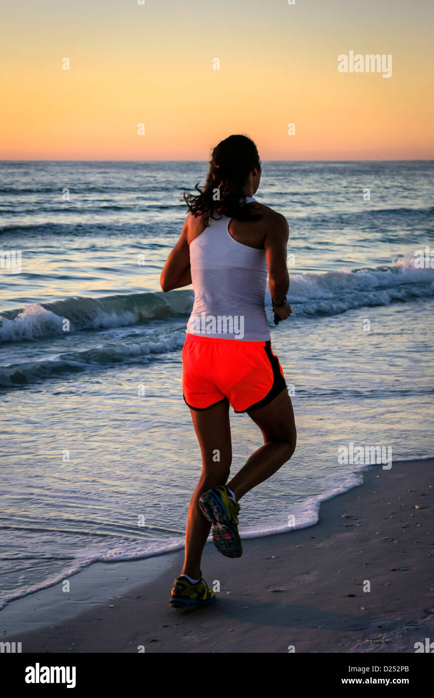 Trainers running beach hi-res stock photography and images - Alamy