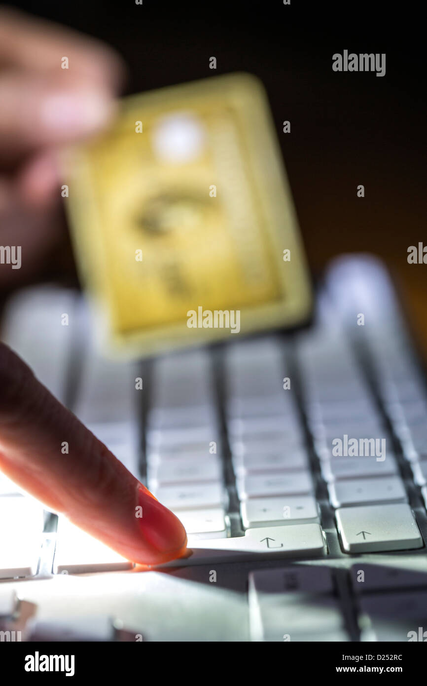 Typing credit card number hi-res stock photography and images - Alamy