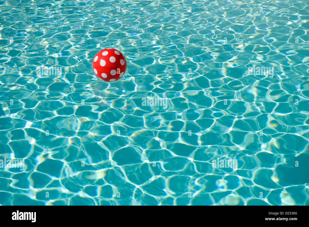 Vacqueyras, France, a red-white dotted ball in a swimming pool Stock ...