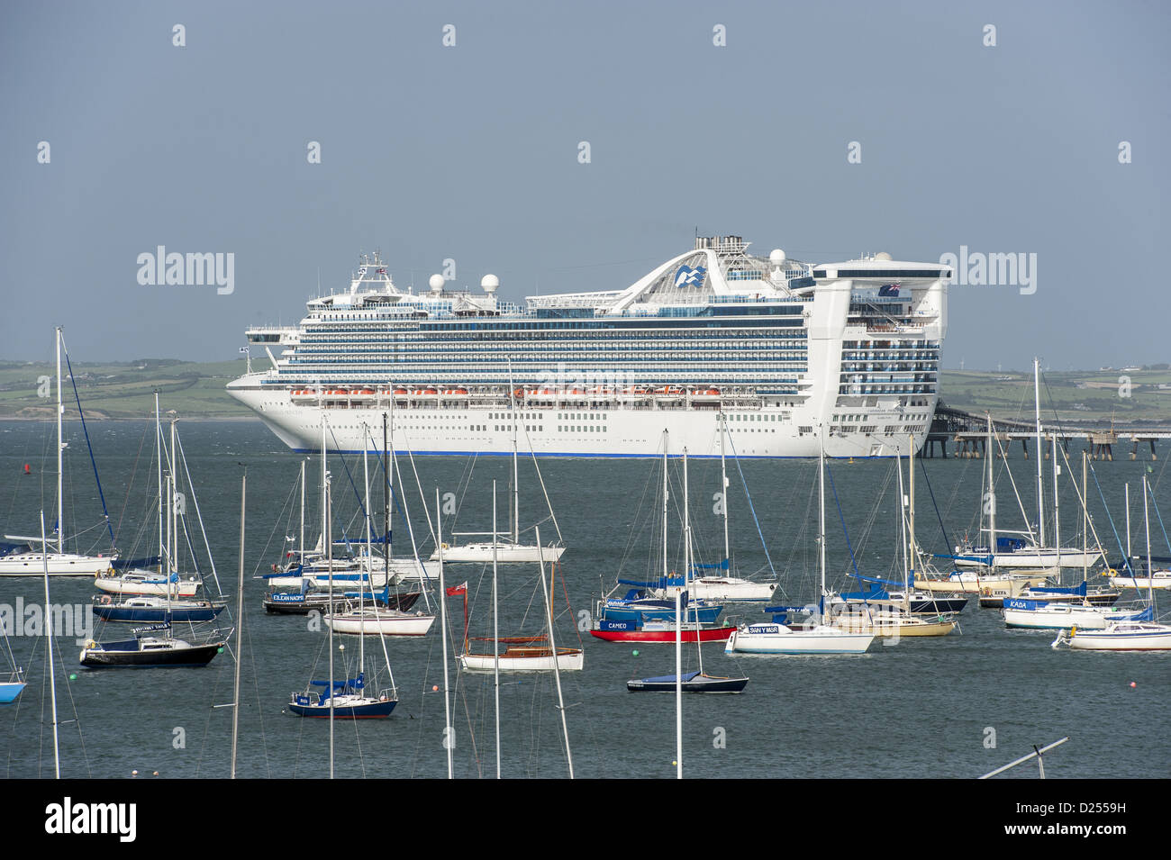 'Caribbean Princess' cruise ship at harbour, with yachts in foreground ...