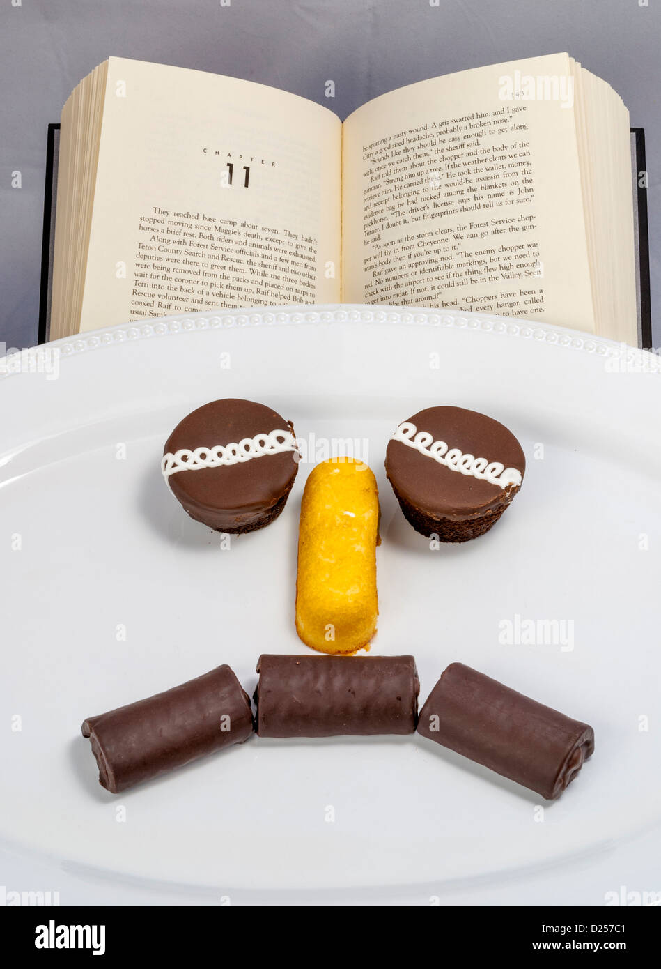 Chapter eleven and snack cakes in the shape of a sad face Stock Photo ...