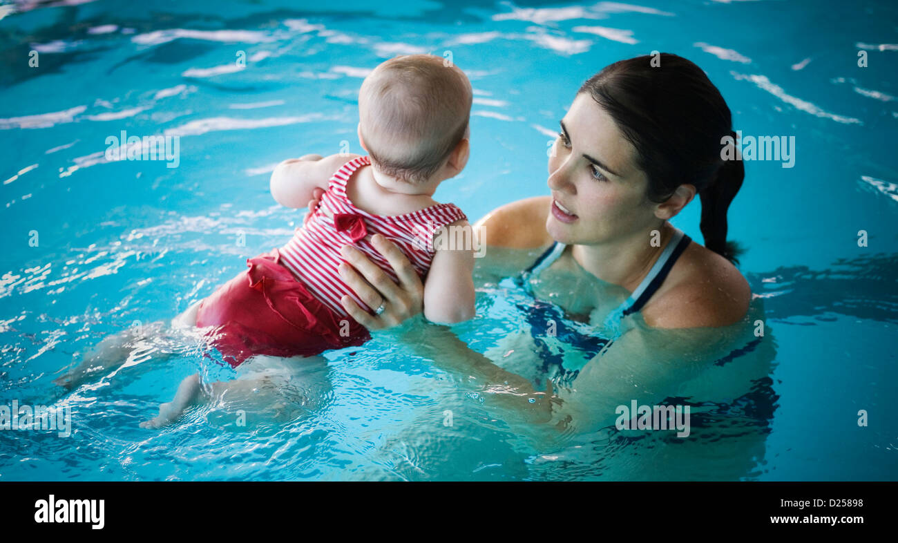 Teaching kids to swim hi-res stock photography and images - Alamy
