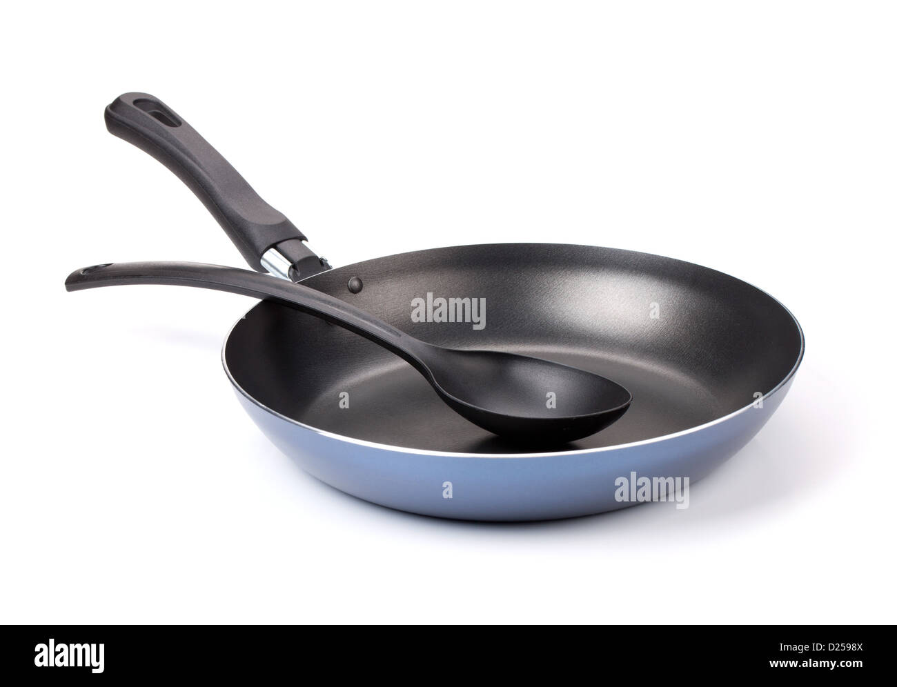 Frying pan with utensil. Isolated on white background Stock Photo - Alamy