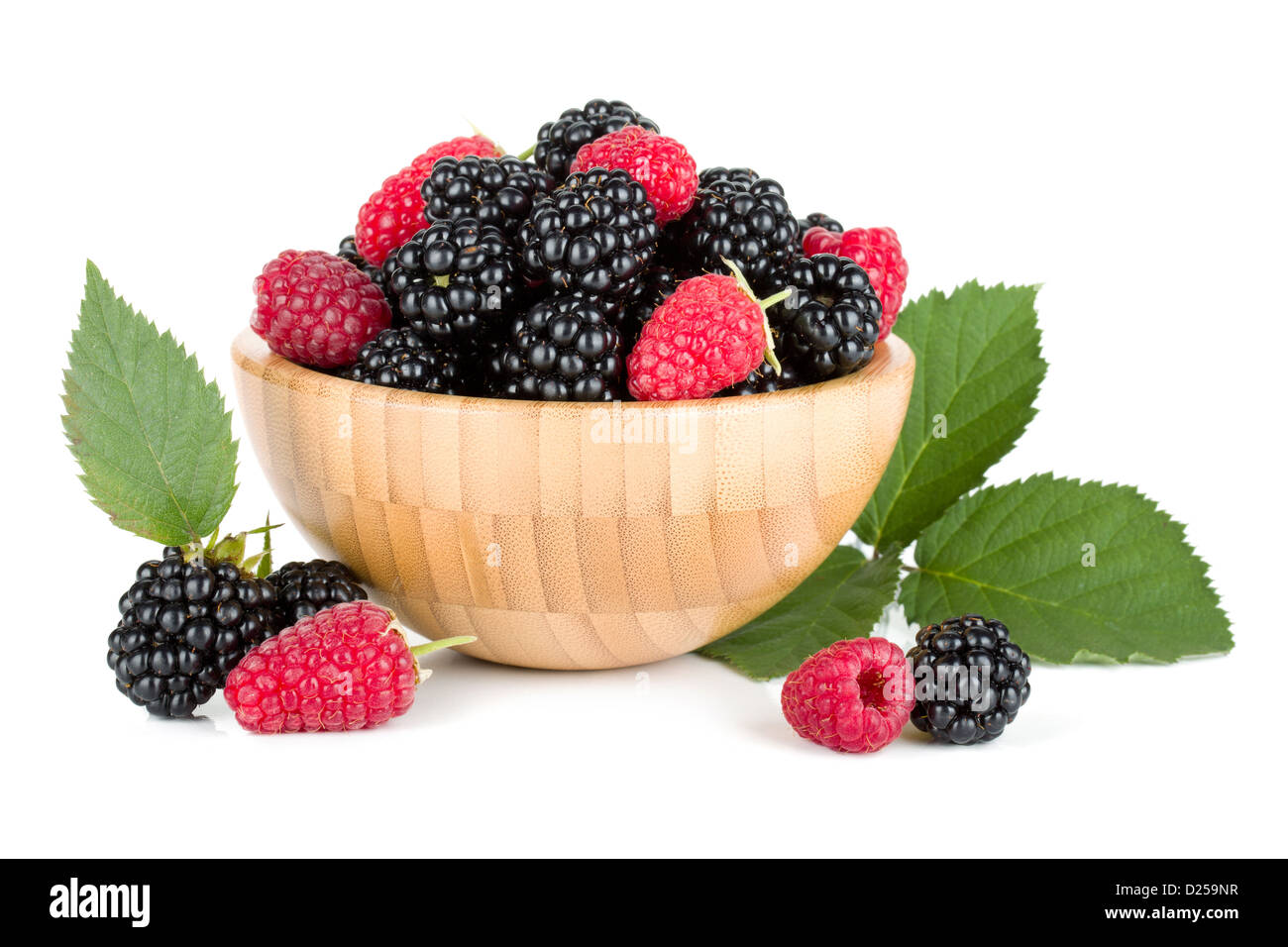 Bowl raspberry on wooden Cut Out Stock Images & Pictures - Alamy