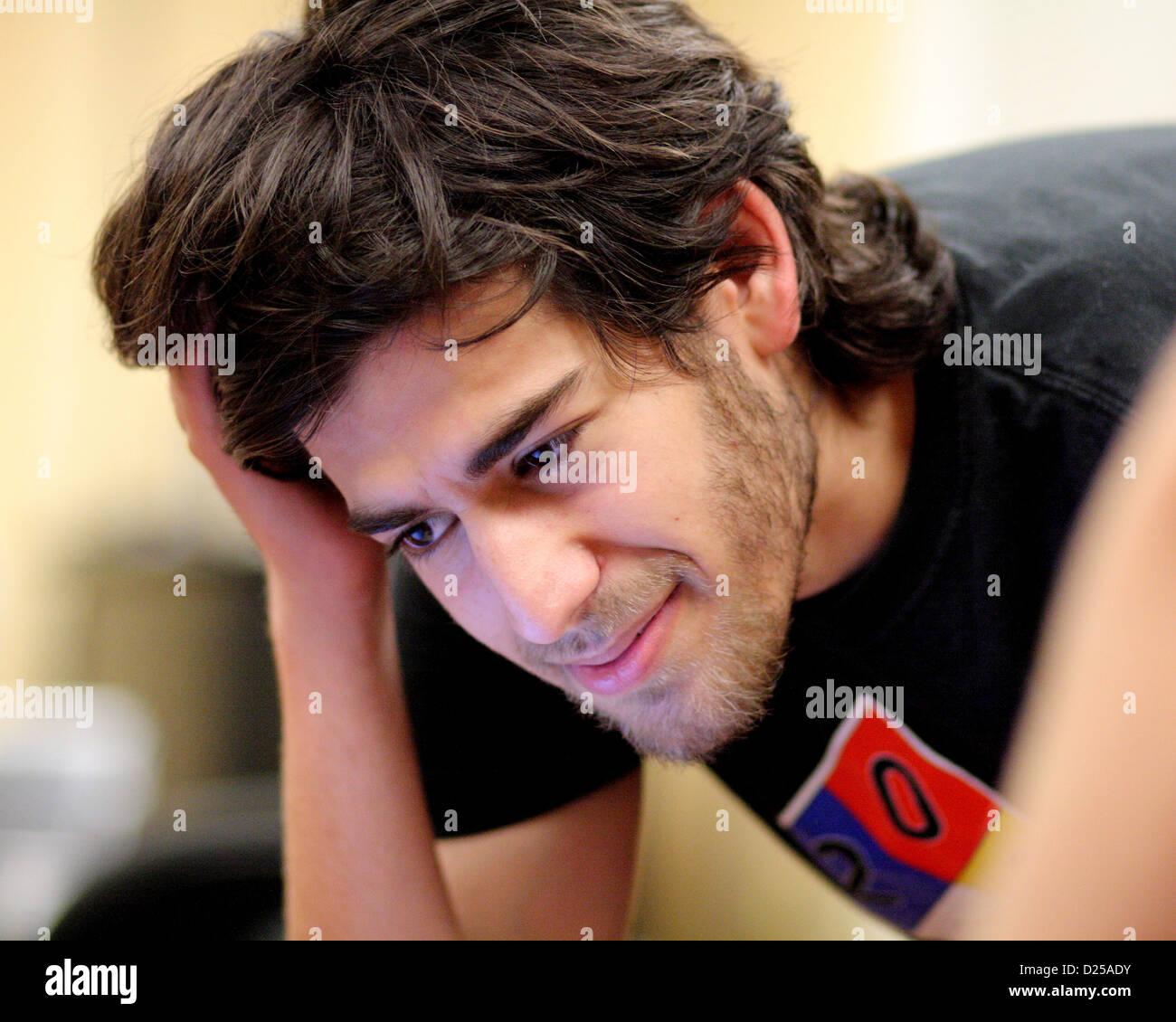 A HANDOUT file shows programmer Aaron Swartz smiling on a photo dated ...