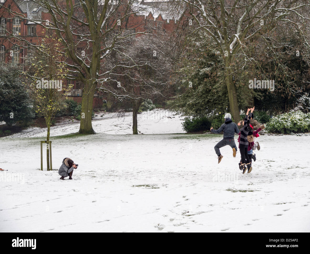 people playing in snow after heavy snowfall in January 2013 across ...