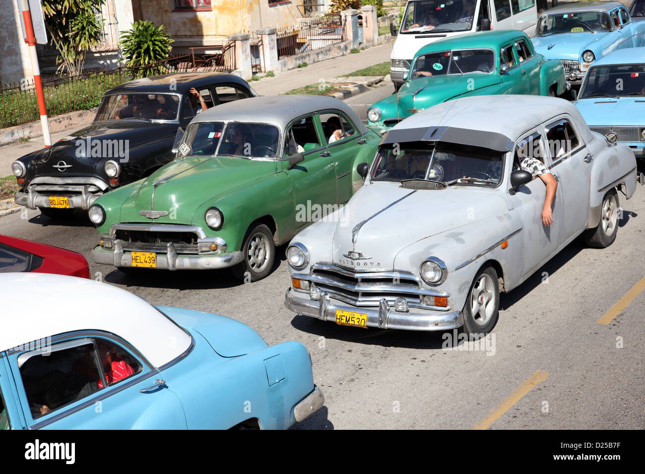Vintage cars of car manfucaturers Oldsmobile (L-R), Chevrolet and ...