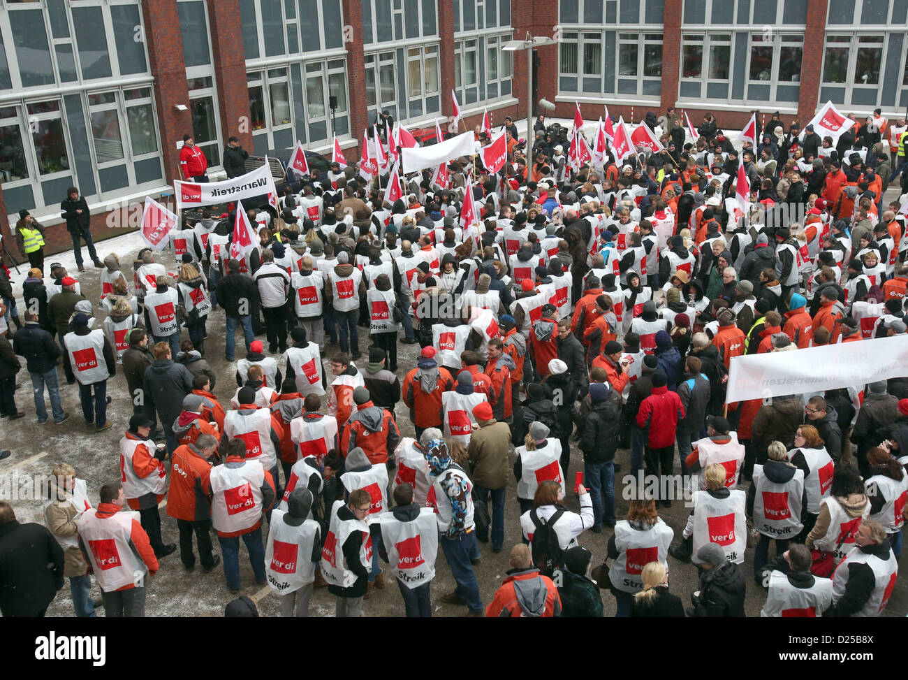 Workers of the energy supplier Eon demonstrate at a token strike in ...
