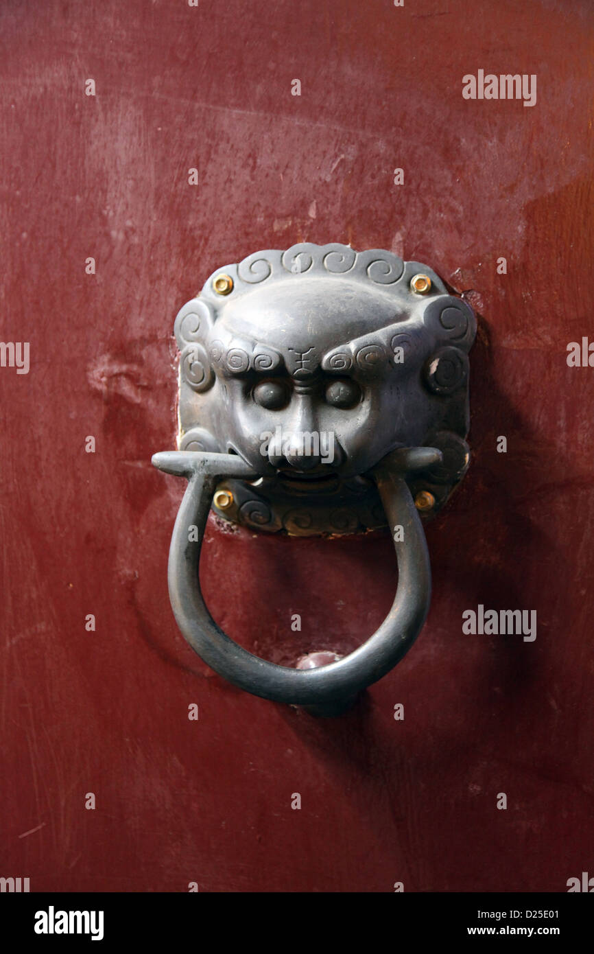 It's a photo of a Ancient Typical Chinese Knocker. It's make of copper ...