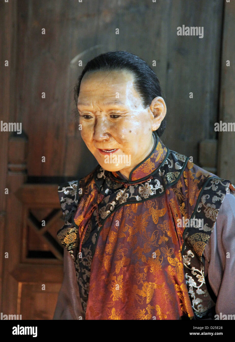 It's a photo of a Close up of a wax model at the museum of history ...