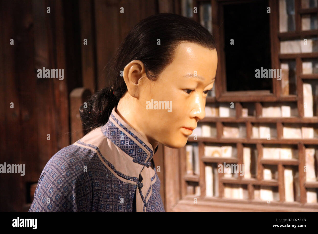 It's a photo of a Close up of a wax model at the museum of history ...