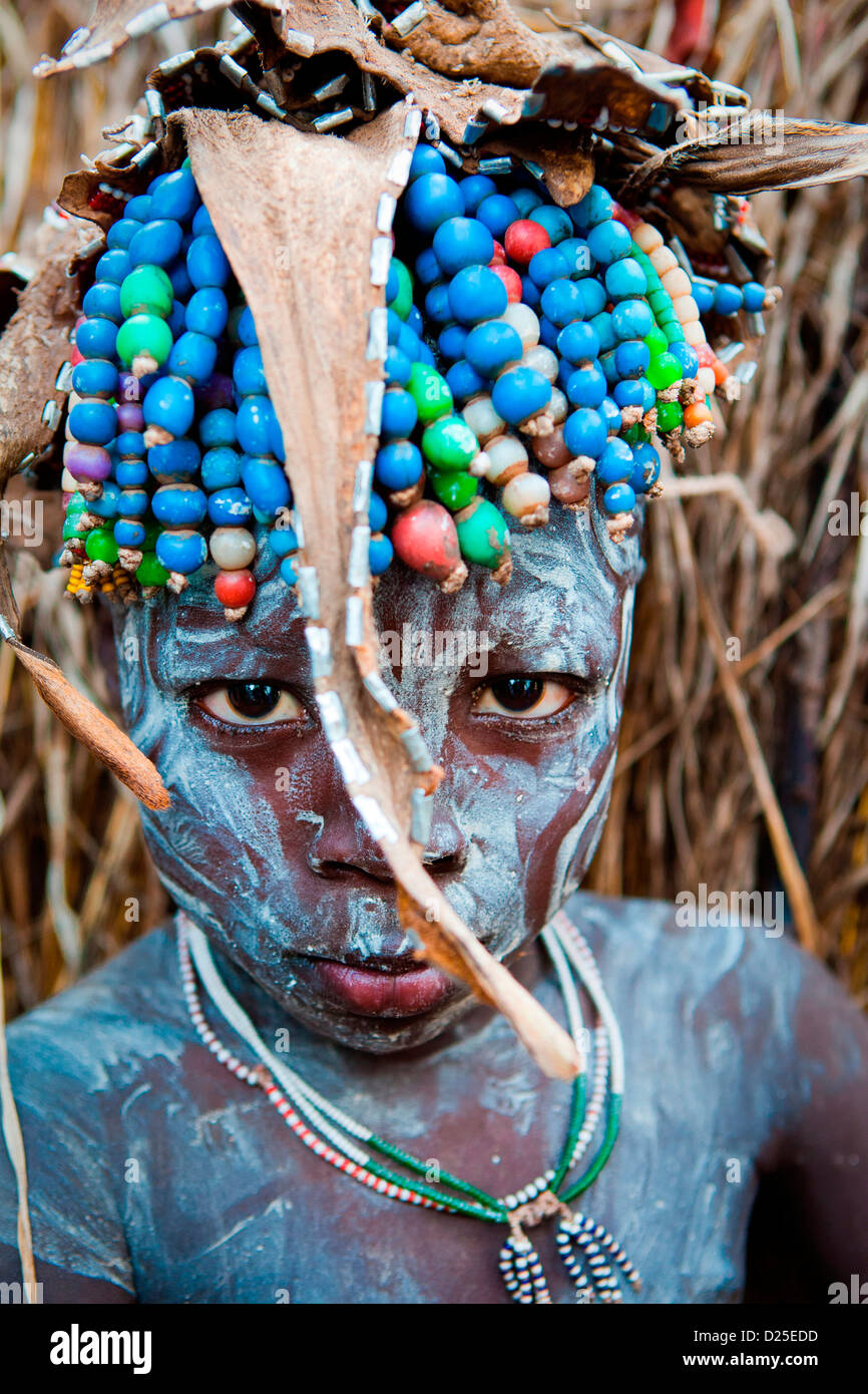 Mursi tribes boy at a village in Mago National Park in the Lower Omo ...
