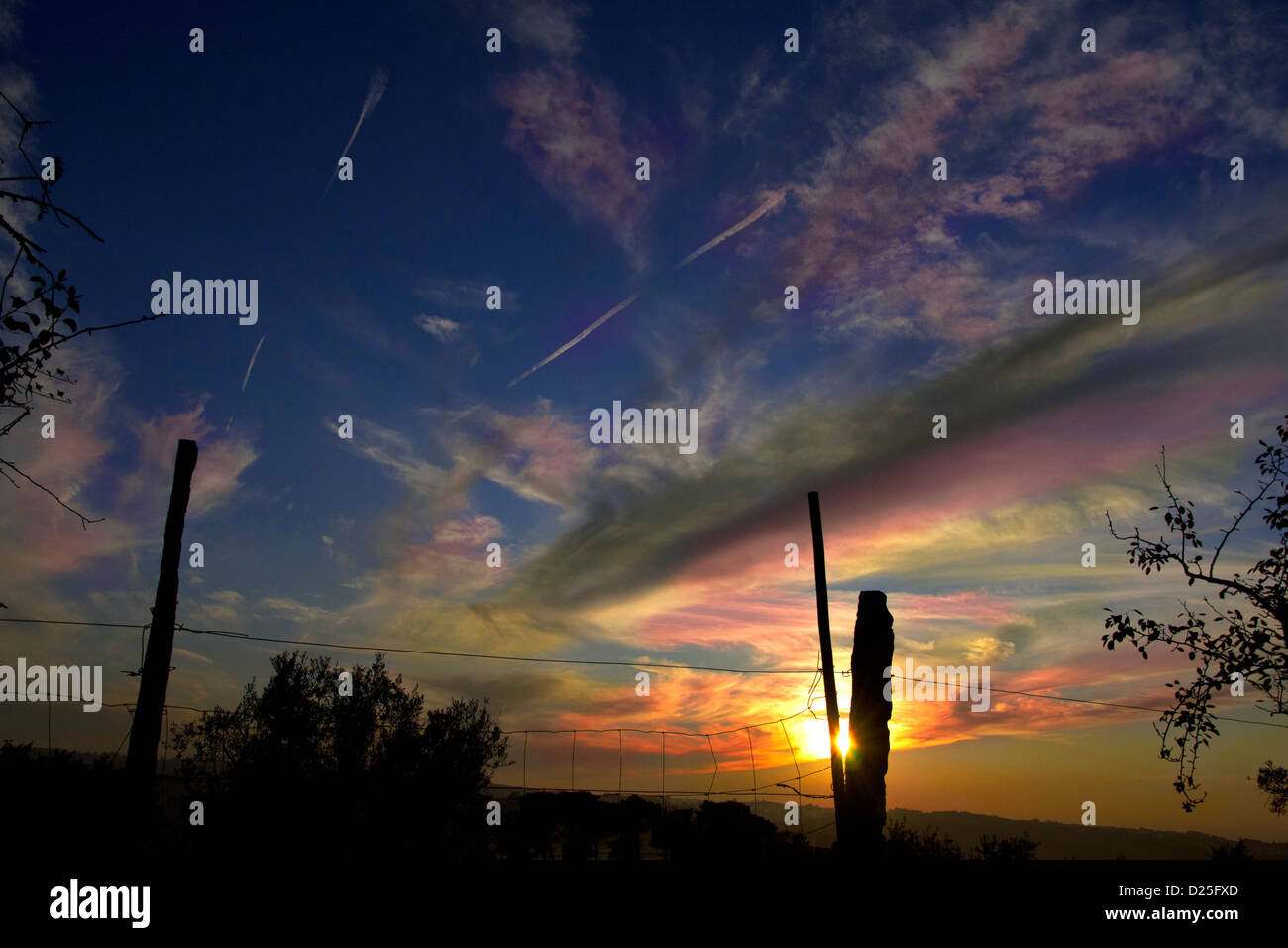 A beautiful sunset on a farm Stock Photo - Alamy