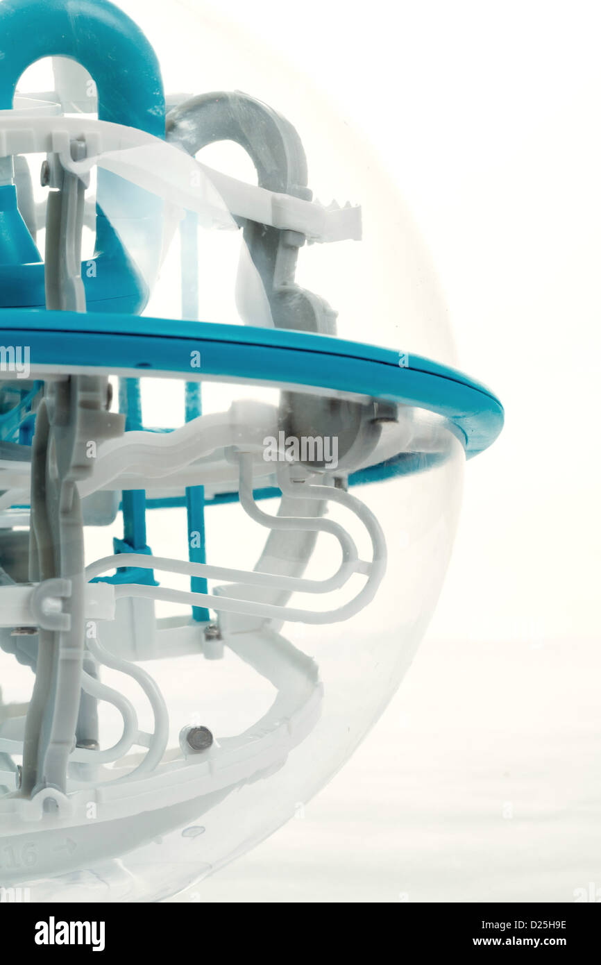 detail of 3D labyrinth ball, game on white background Stock Photo - Alamy