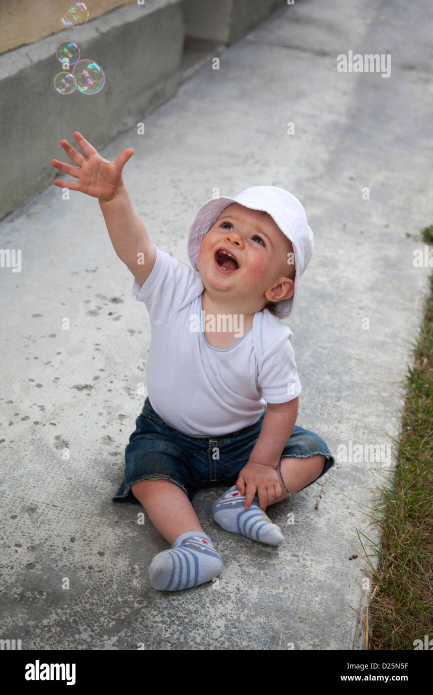 arm Arms full length outdoors Exterior Outdoor Outside sitting Sit Sits ...