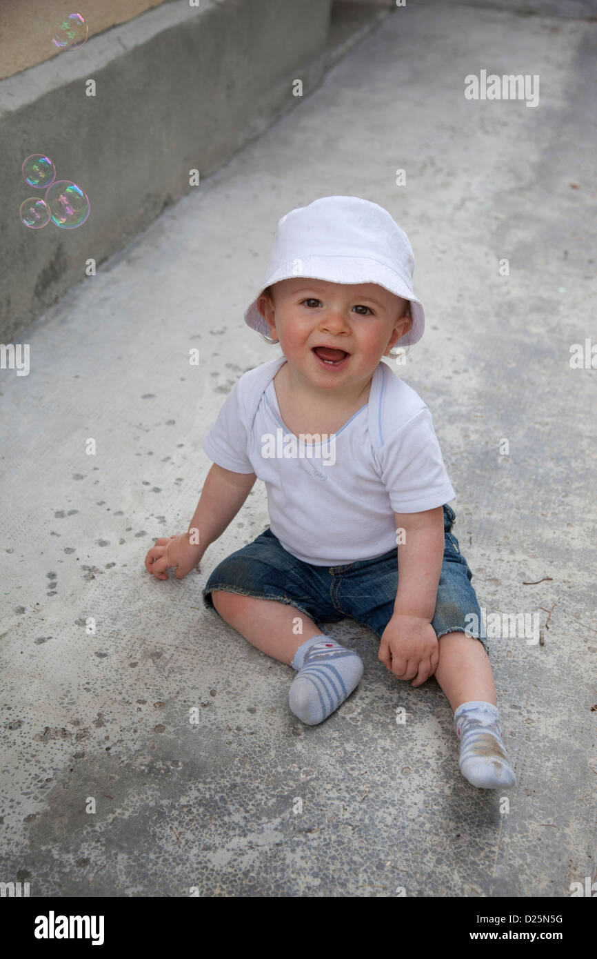 full length outdoors Exterior Outdoor Outside sitting Sit Sits Seated ...