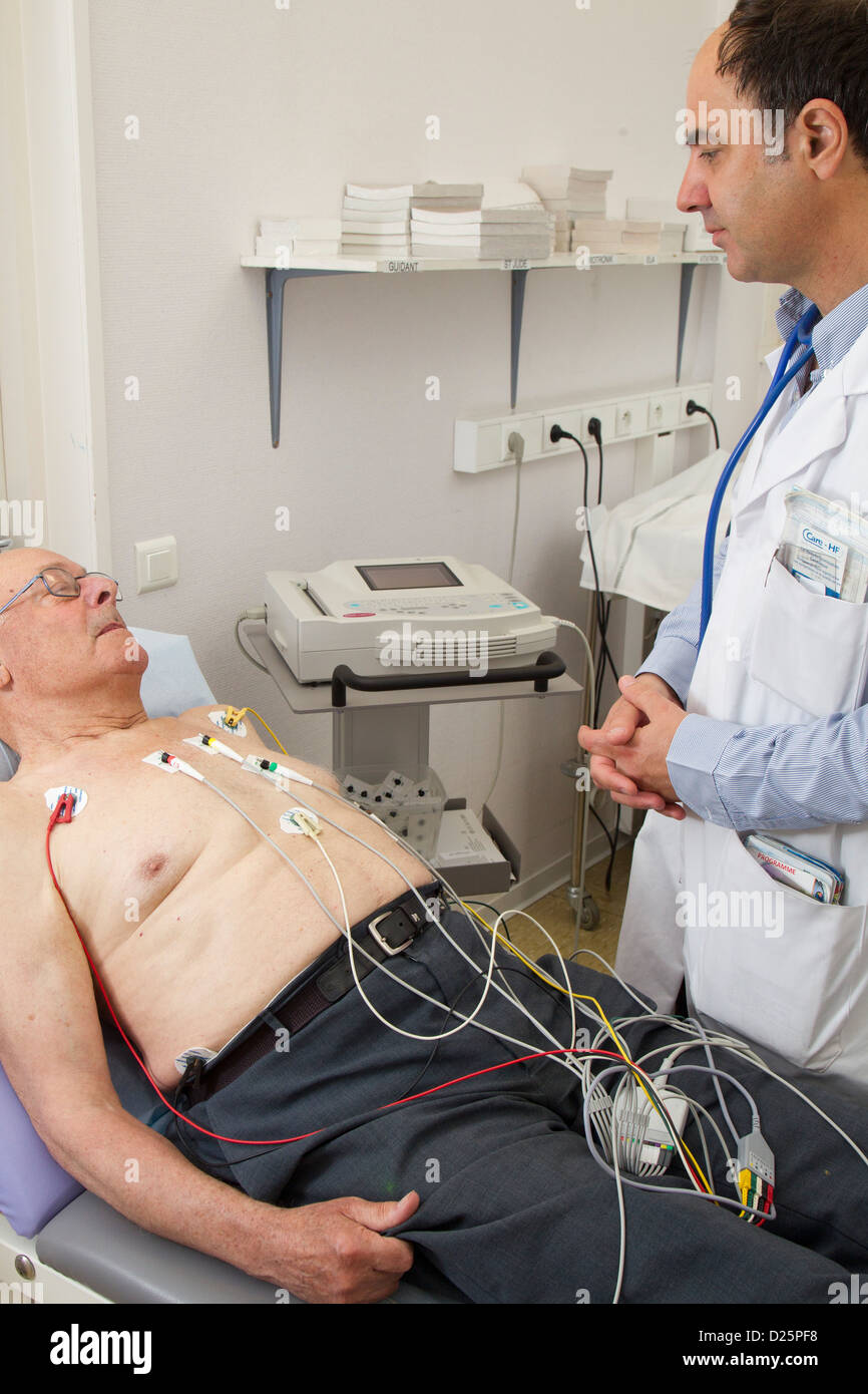Hospital patient undergoing electrocardiogram hi-res stock photography ...