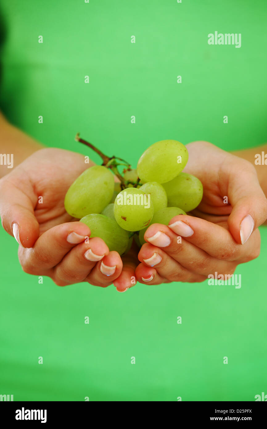 grape in woman hands close up Stock Photo - Alamy