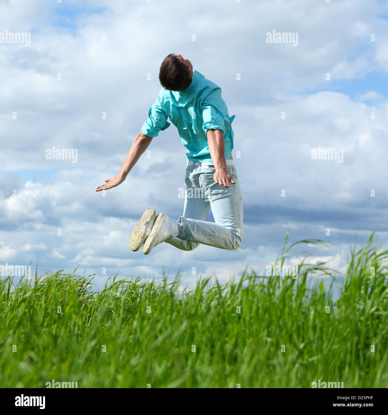 man jump in the blue sky Stock Photo - Alamy
