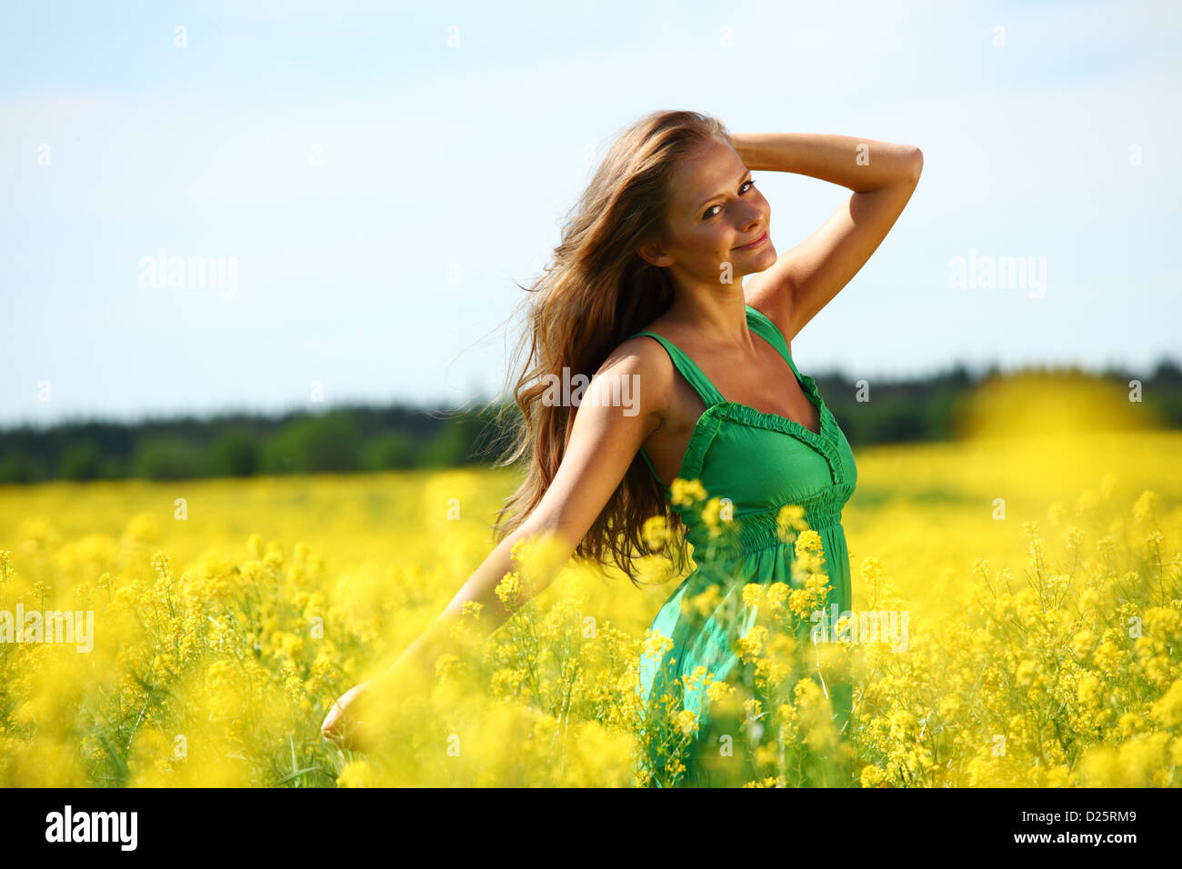 woman on oilseed field close portrait Stock Photo - Alamy