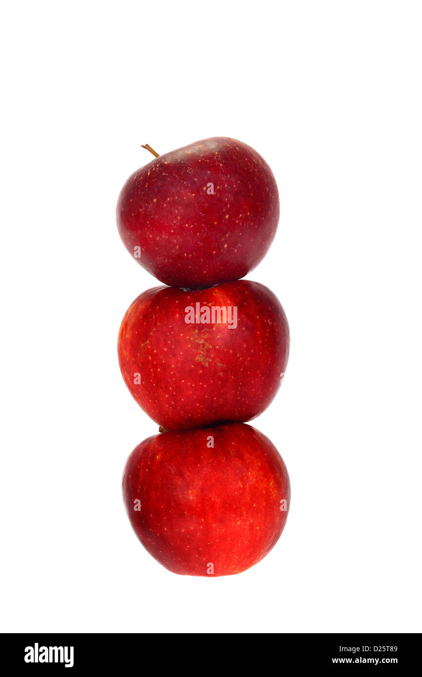 Three red apples stacked one on another isolated on white background ...