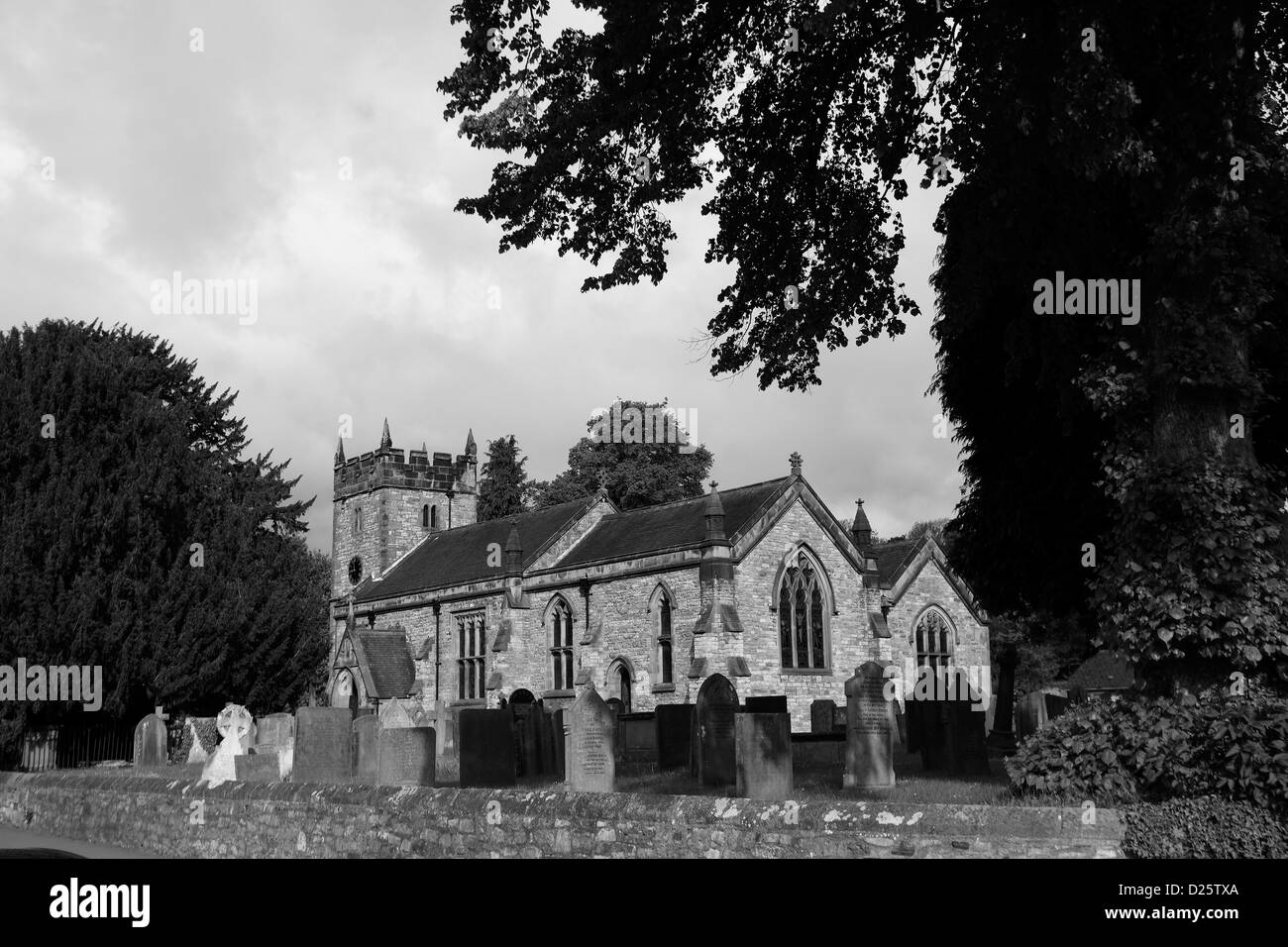 Summertime view church of the Holy Trinity, Ashford in the Water ...