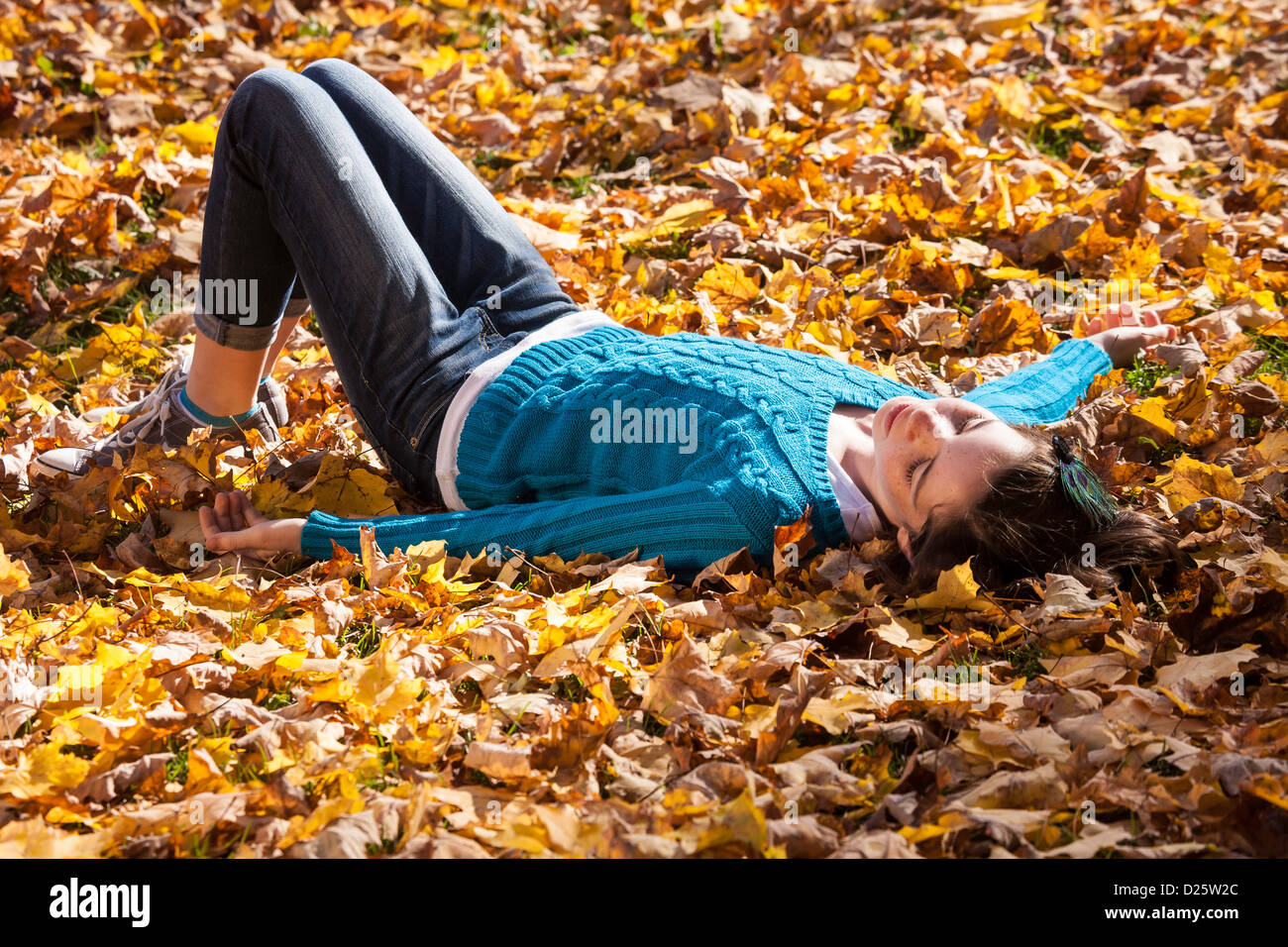 Young Girl Enjoying Fall Leaves, New York State Stock Photo - Alamy