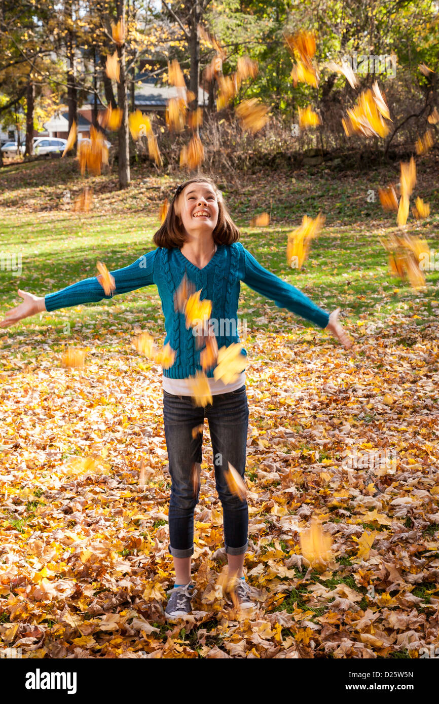 Young Girl Enjoying Fall Leaves, New York State Stock Photo - Alamy