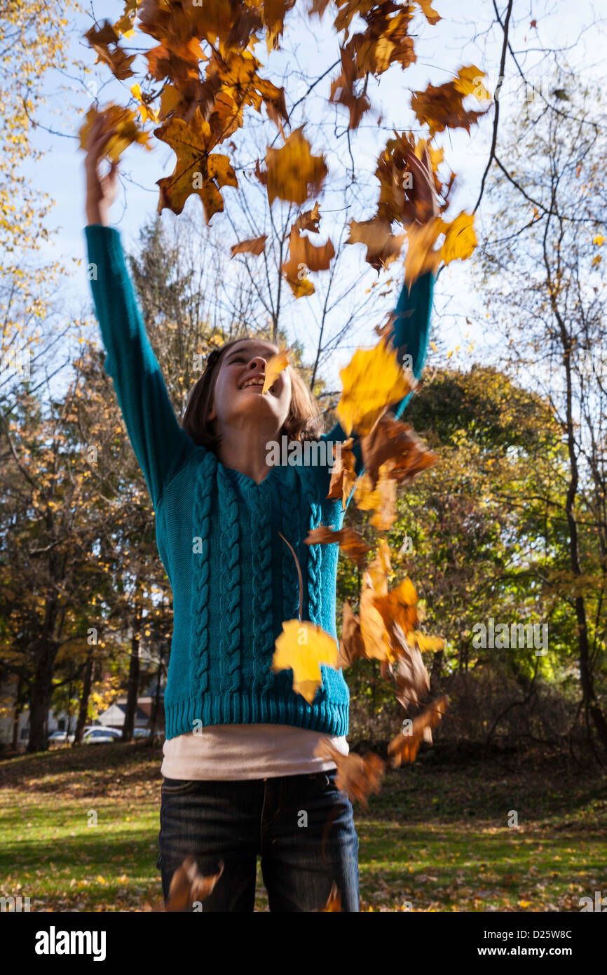 Young Girl Enjoying Fall Leaves, New York State Stock Photo - Alamy