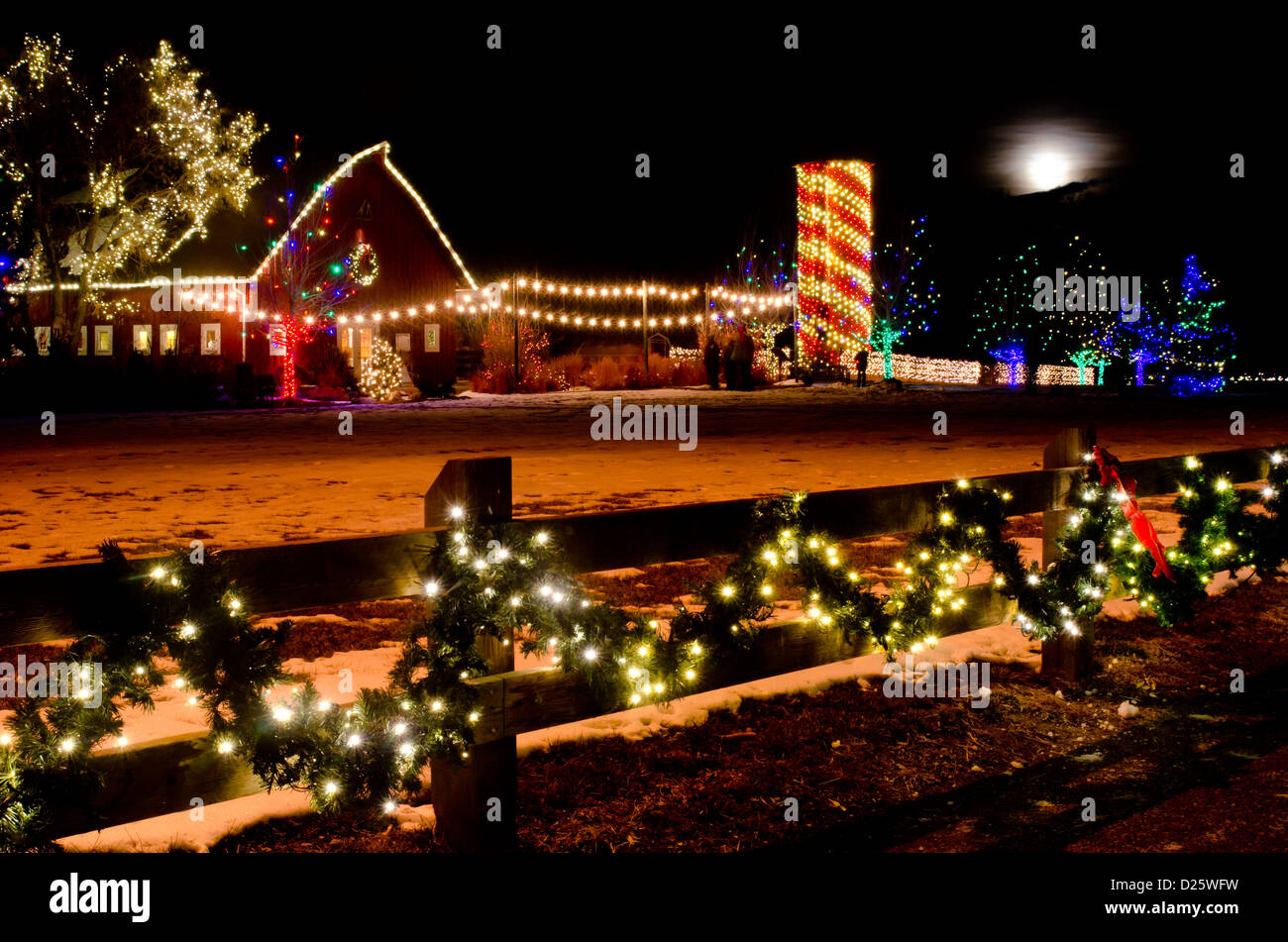 An old ranch is all decked out in Christmas lights, with a festive full ...