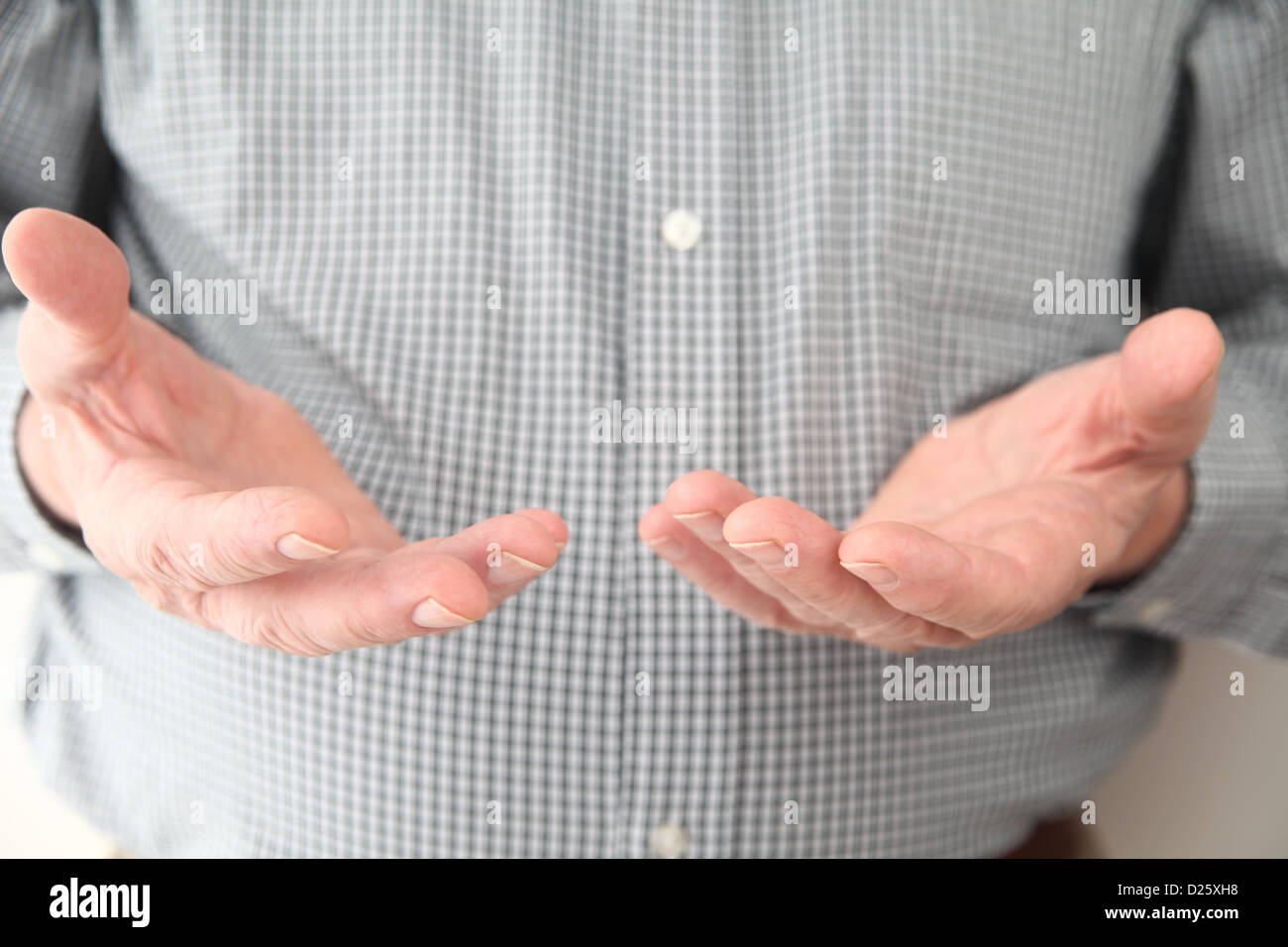 a man gestures with both hands Stock Photo - Alamy