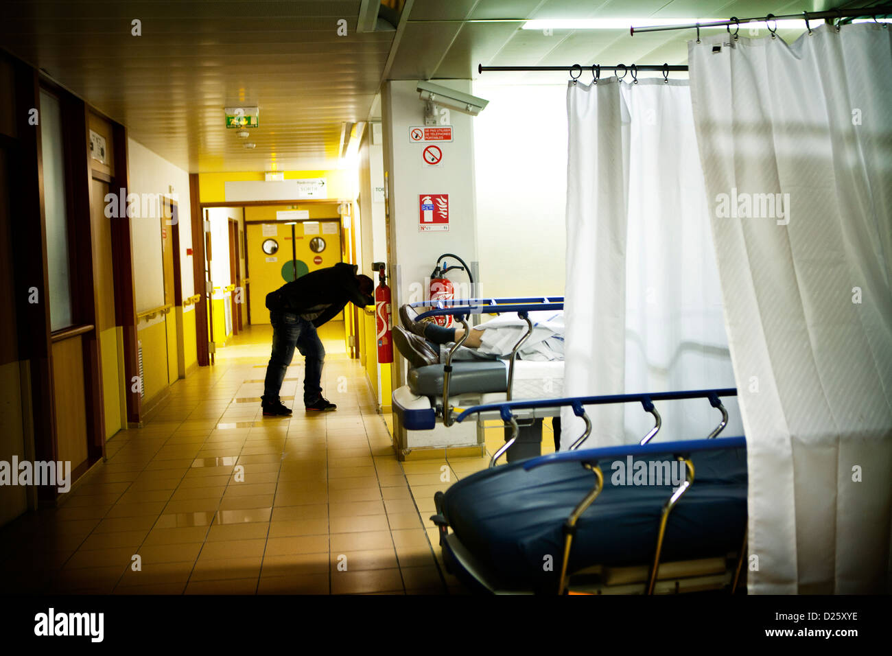 Sad people hospital hallway hi-res stock photography and images - Alamy