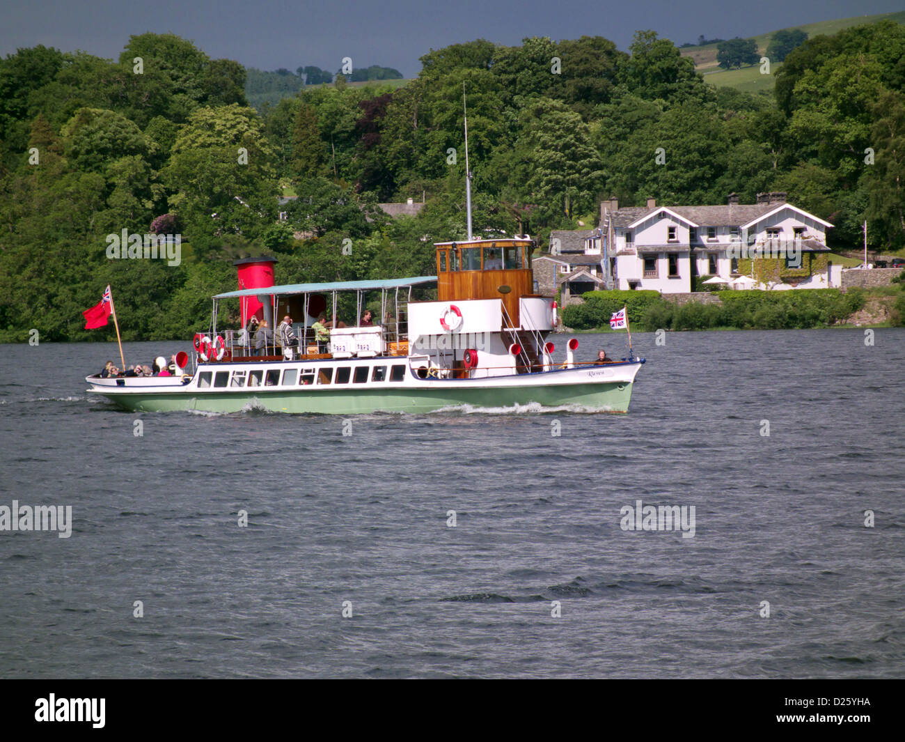 Ullswater ferry, Raven, steams by the Sharrow Bay Hotel. Ullswater Lake ...