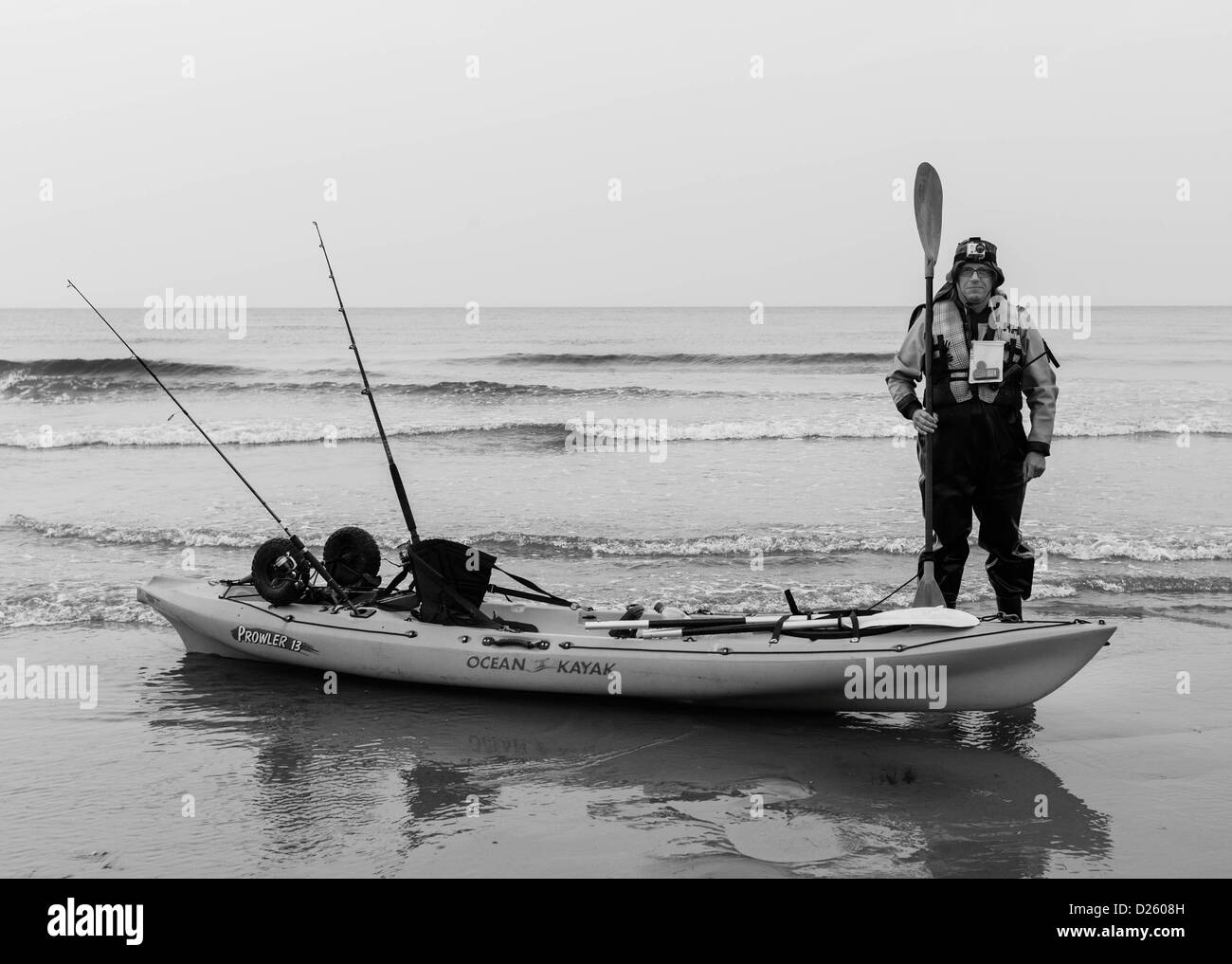 A kayak fisherman returns to shore at Saltburn, Cleveland after a days ...