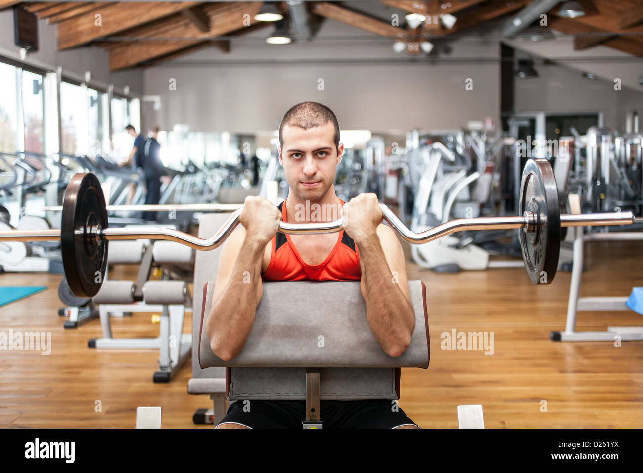 Man working out in a gym Stock Photo - Alamy