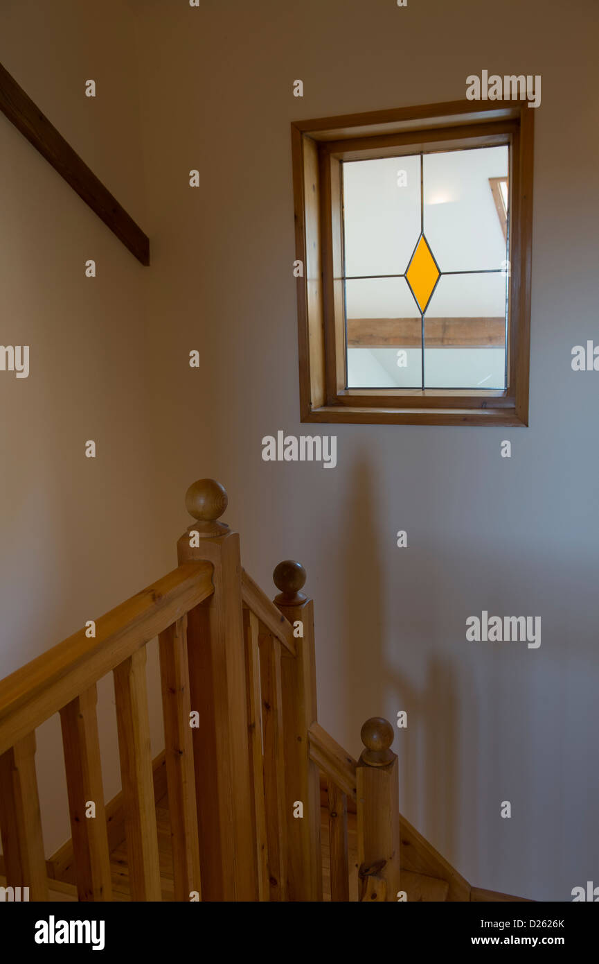 Pretty little interior window on the staircase of a newly converted ...