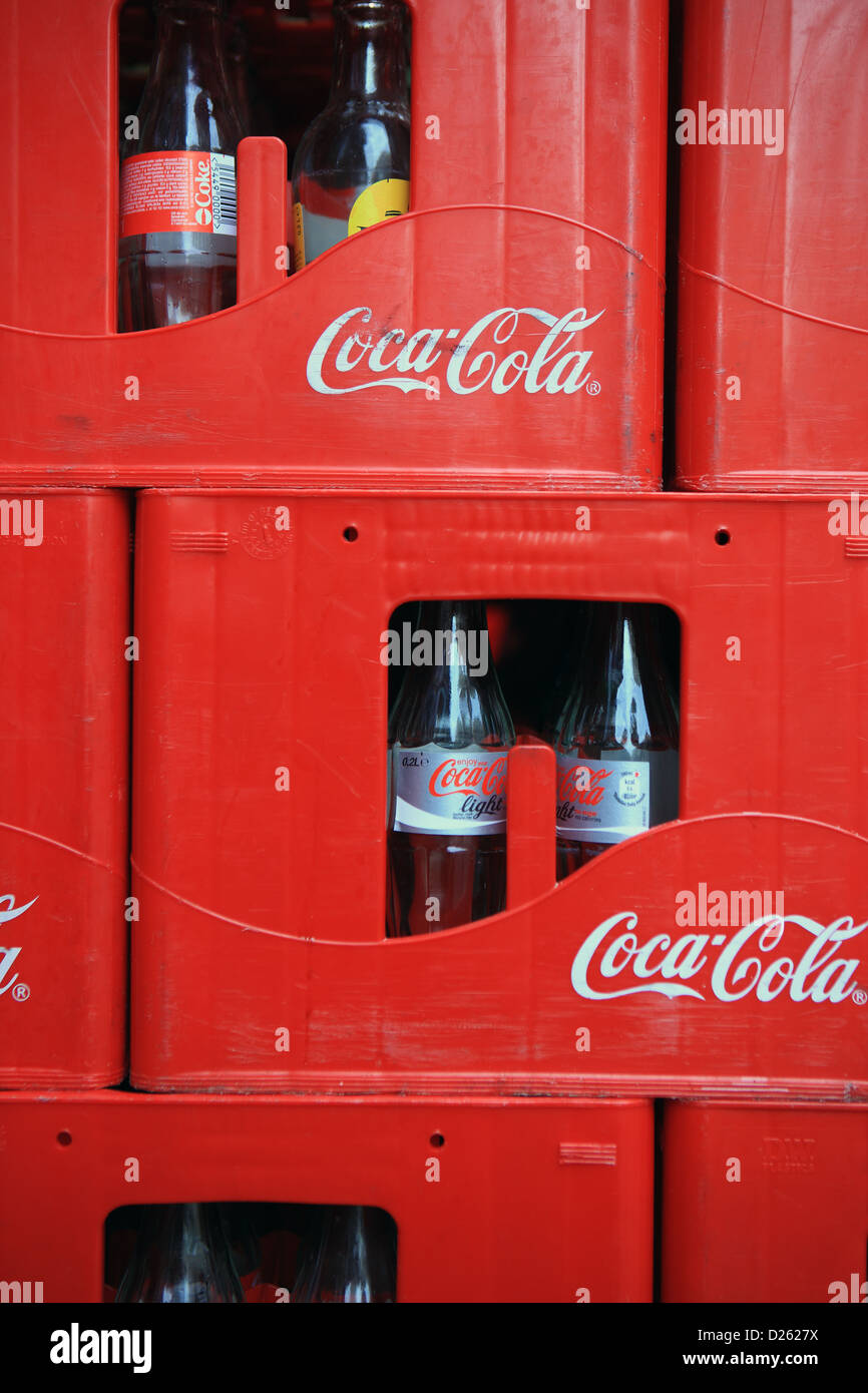 Stacked Coca-Cola crates of empty bottles Stock Photo - Alamy
