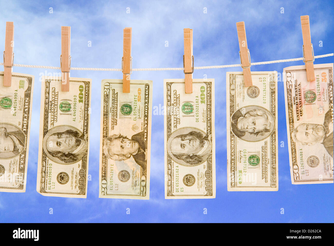 Money on clothes line Stock Photo - Alamy