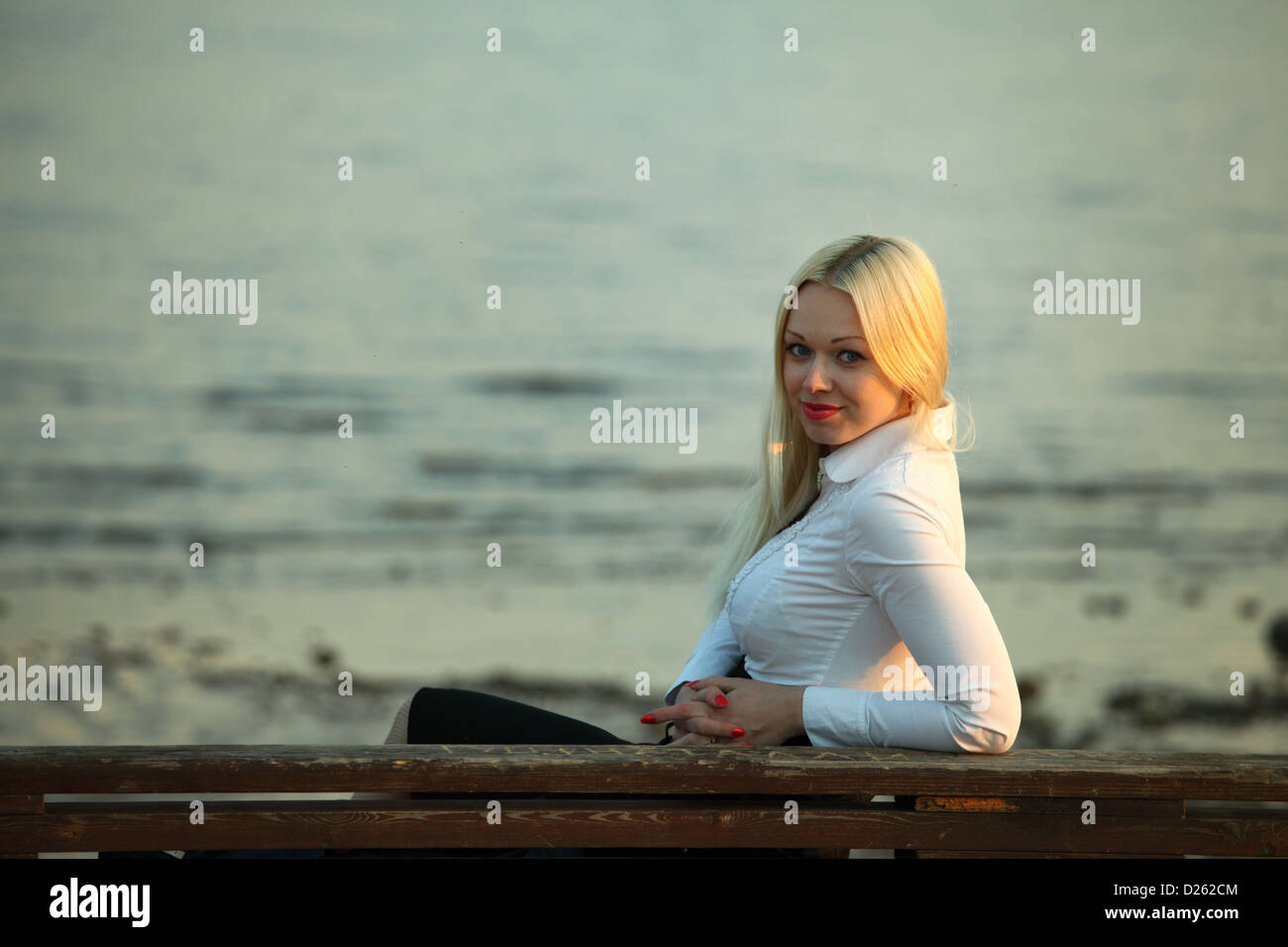 woman portrait lake on background Stock Photo - Alamy