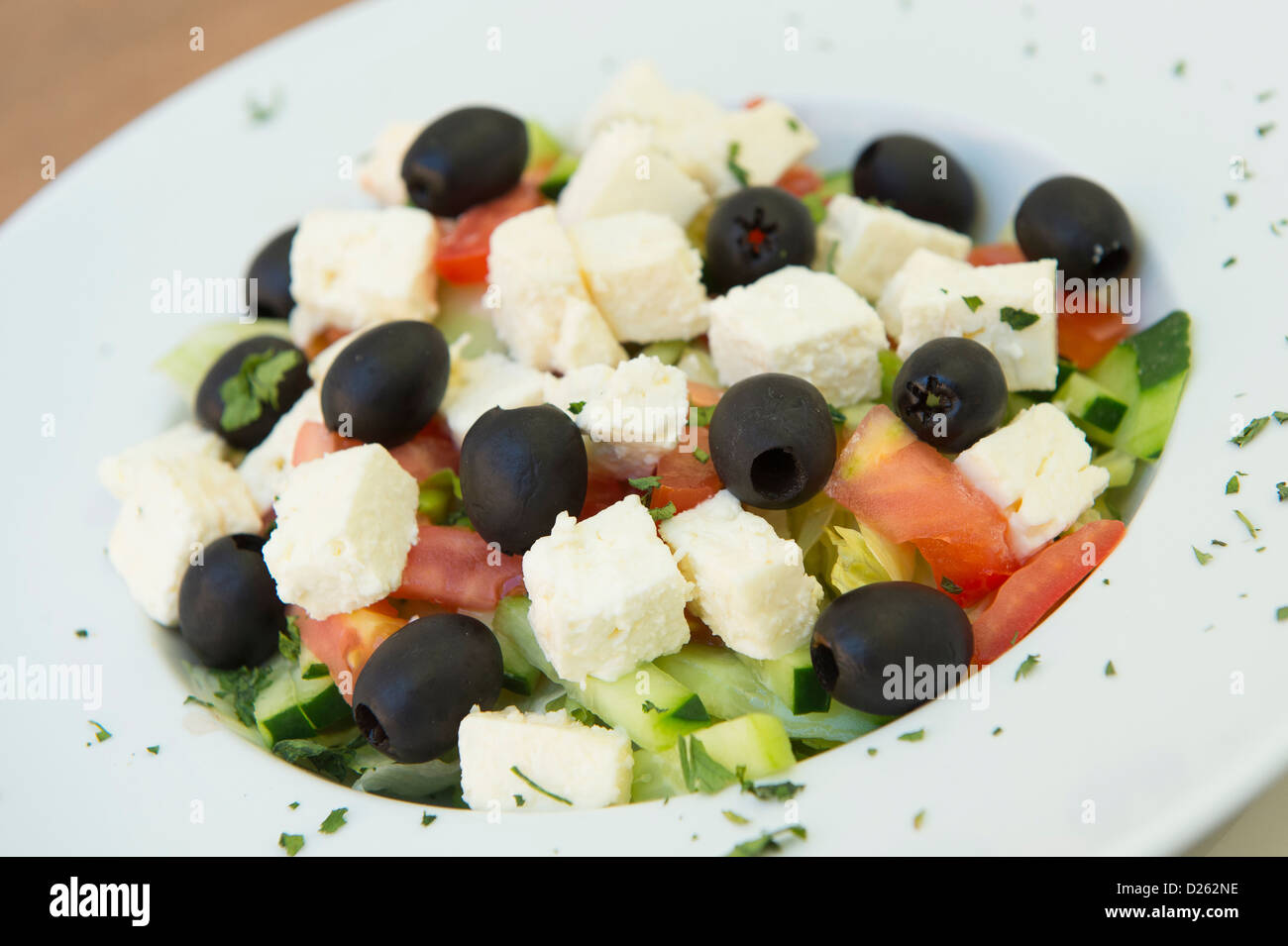 Tasty looking greek feta cheese salad served with olives Stock Photo ...