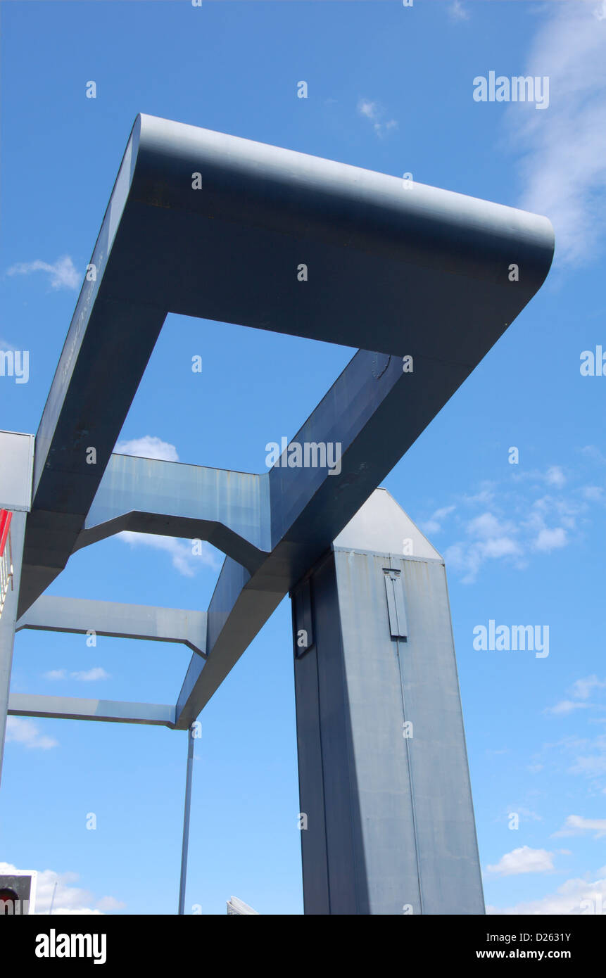 Bridge raising mechanism arch in London's docklands Stock Photo - Alamy