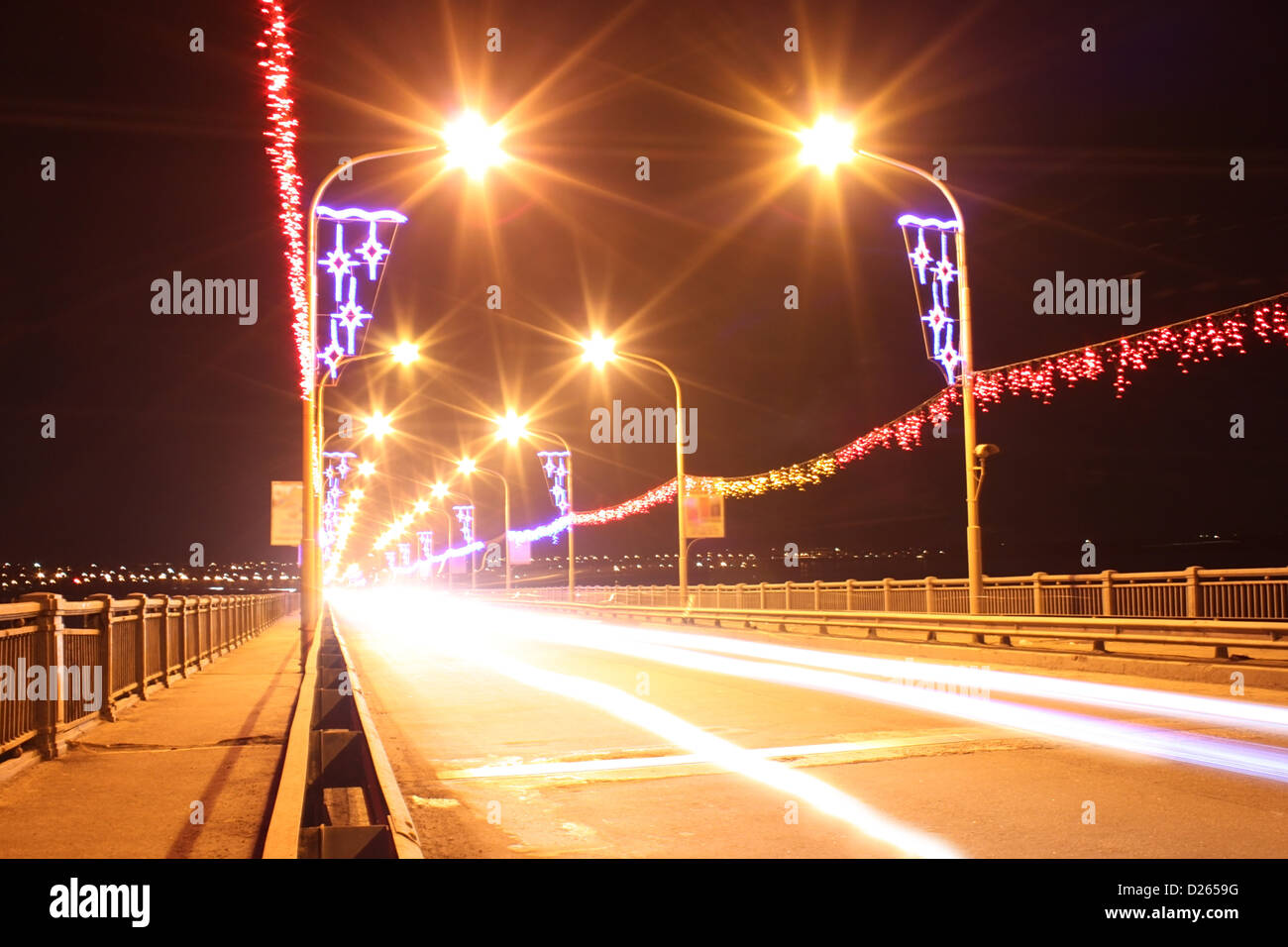 light tracks of cars on bridge at night Stock Photo - Alamy