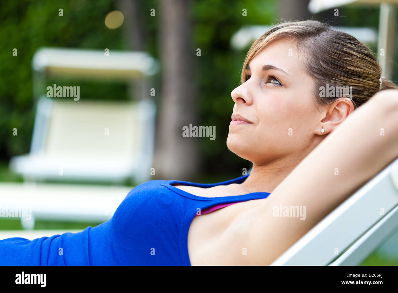 Woman relaxing outdoor Stock Photo - Alamy